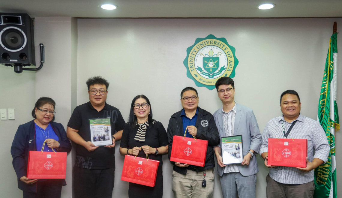 TUA VPs meet with QH Education officials -TUA